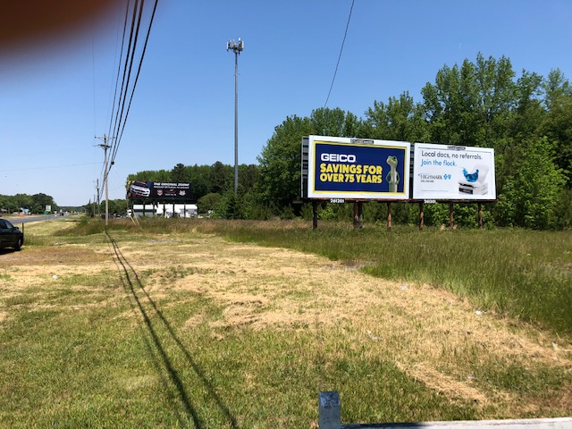 Vacant Land w/ Cell Tower and Billboard - Genesis Holding Company